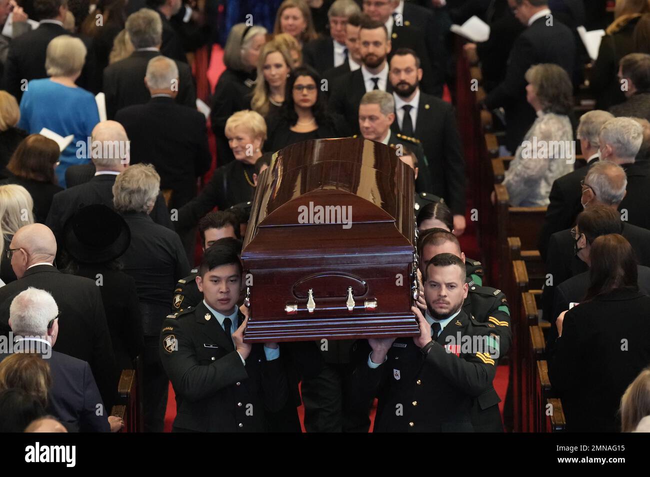 Pallbearers carry the casket of former Ontario lieutenant-governor ...