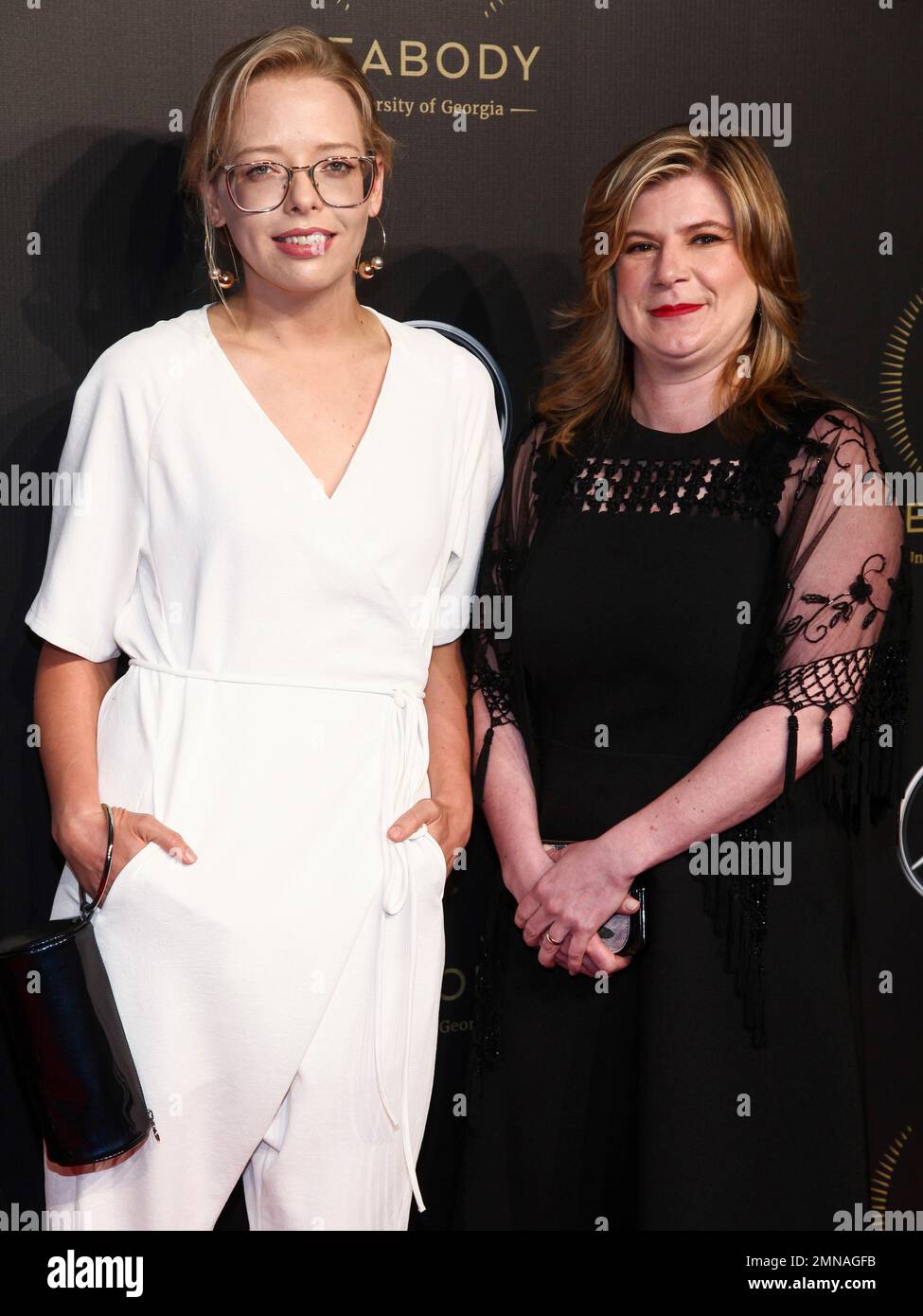 Elle Reeve, left, and Madeleine Haeringer, right, attend the 77th ...