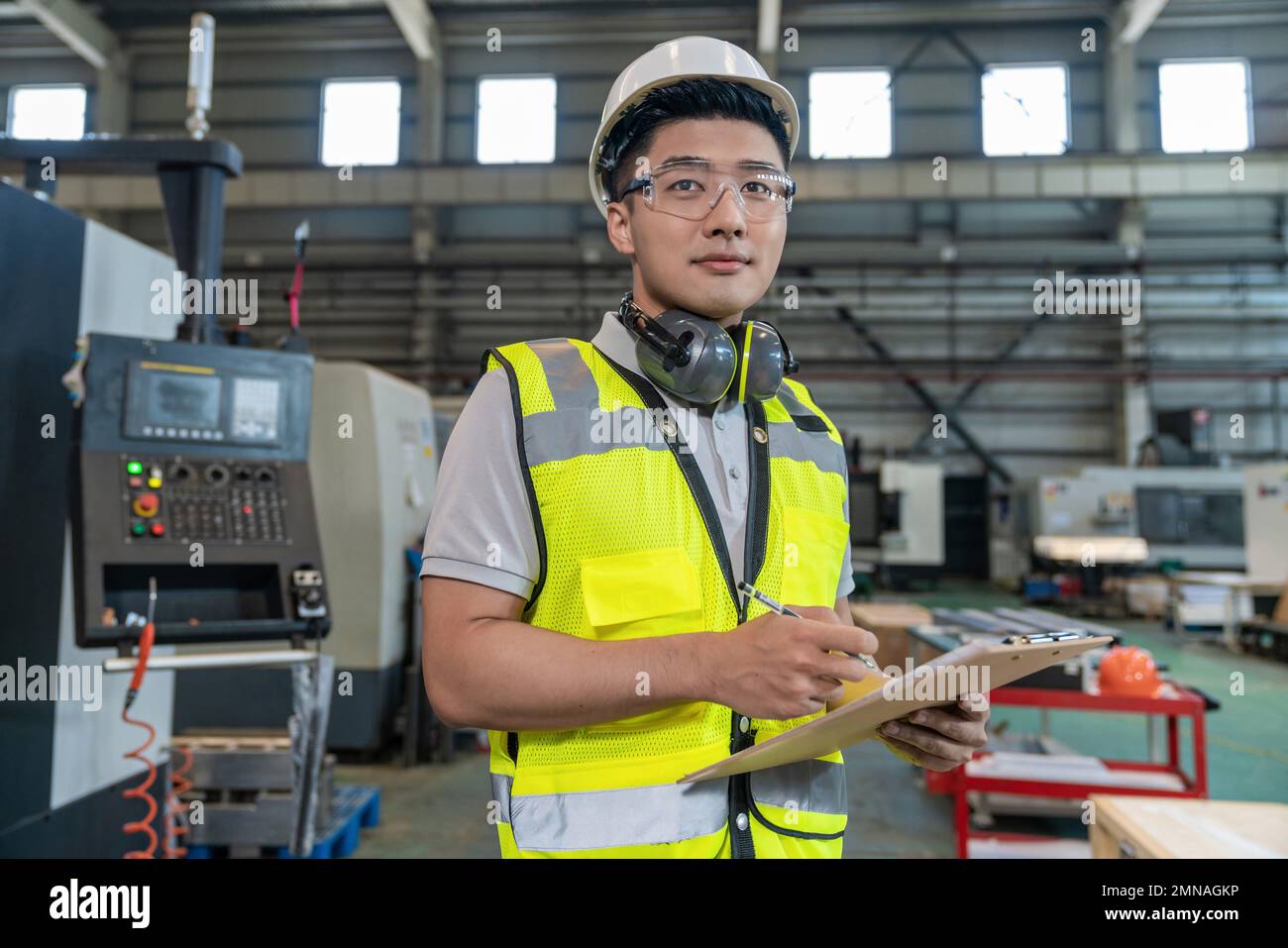 Engineers working in the factory Stock Photo - Alamy