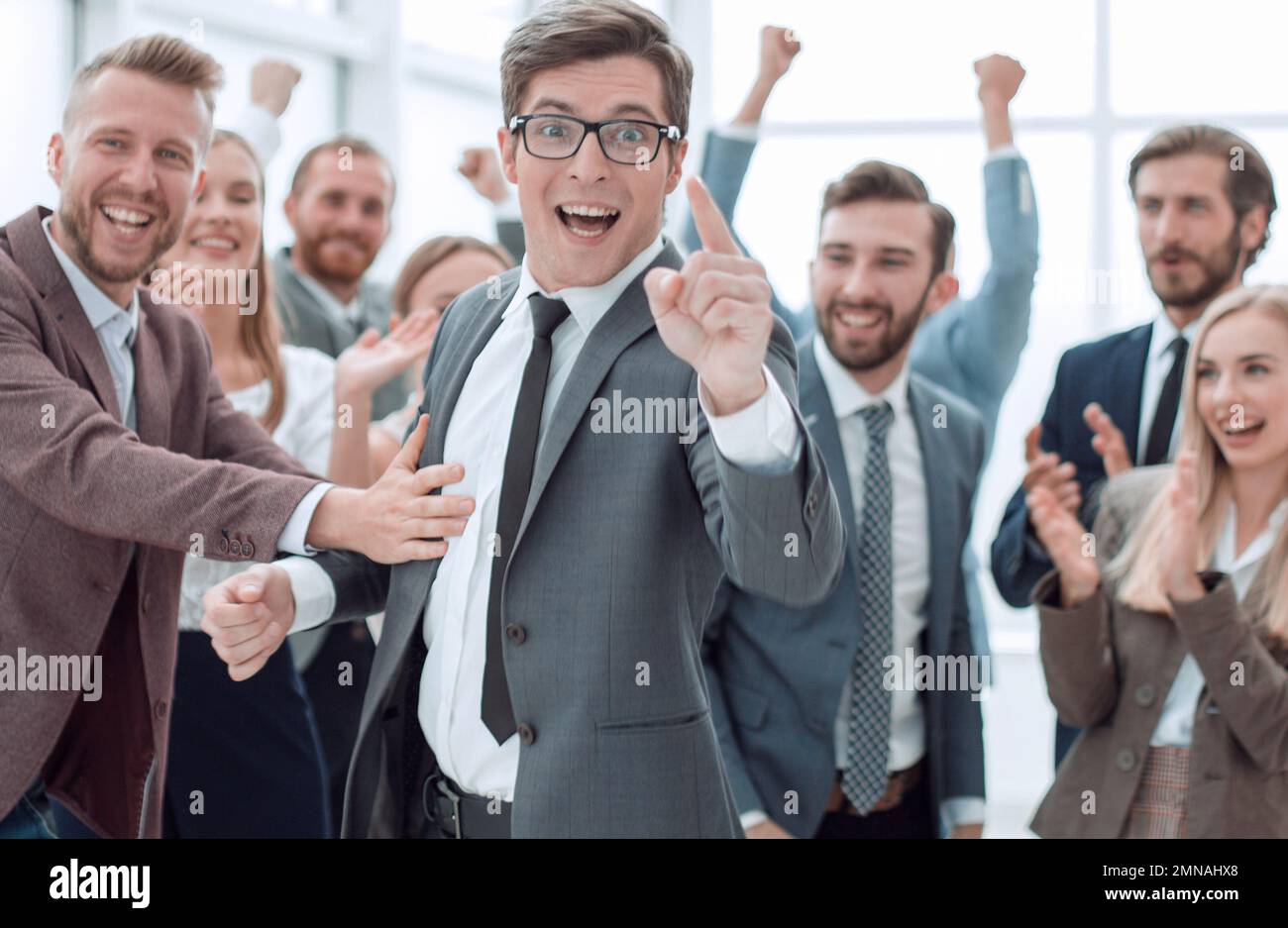 boss and the gleeful business team standing together Stock Photo - Alamy