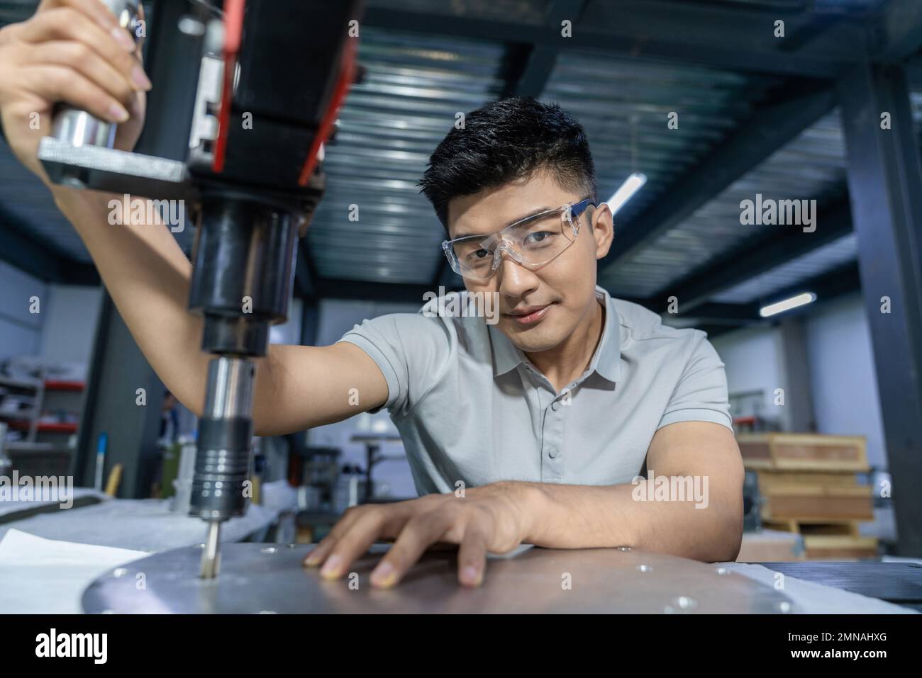 Engineers working in the factory Stock Photo - Alamy