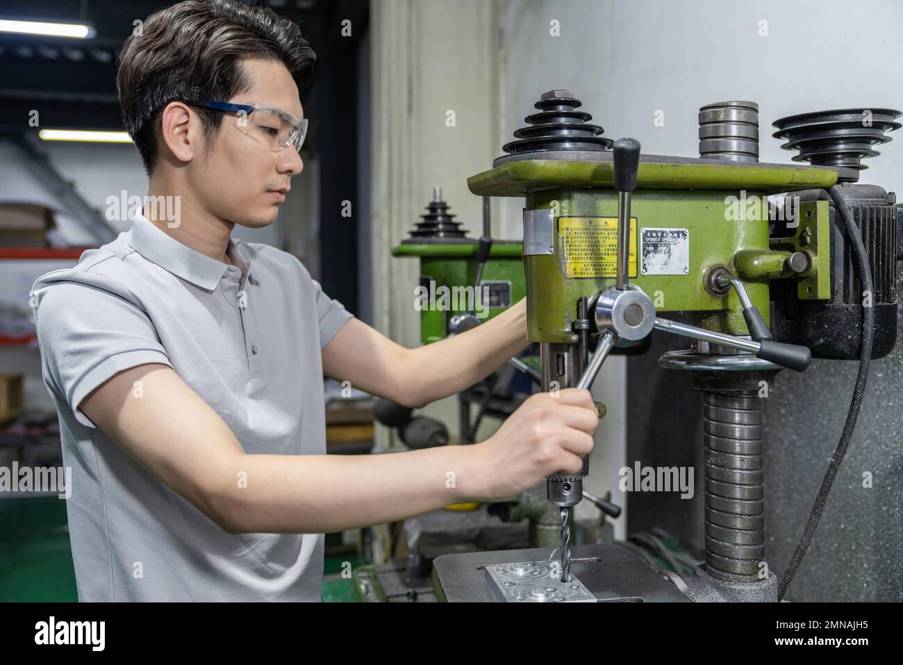 Engineers working in the factory Stock Photo - Alamy