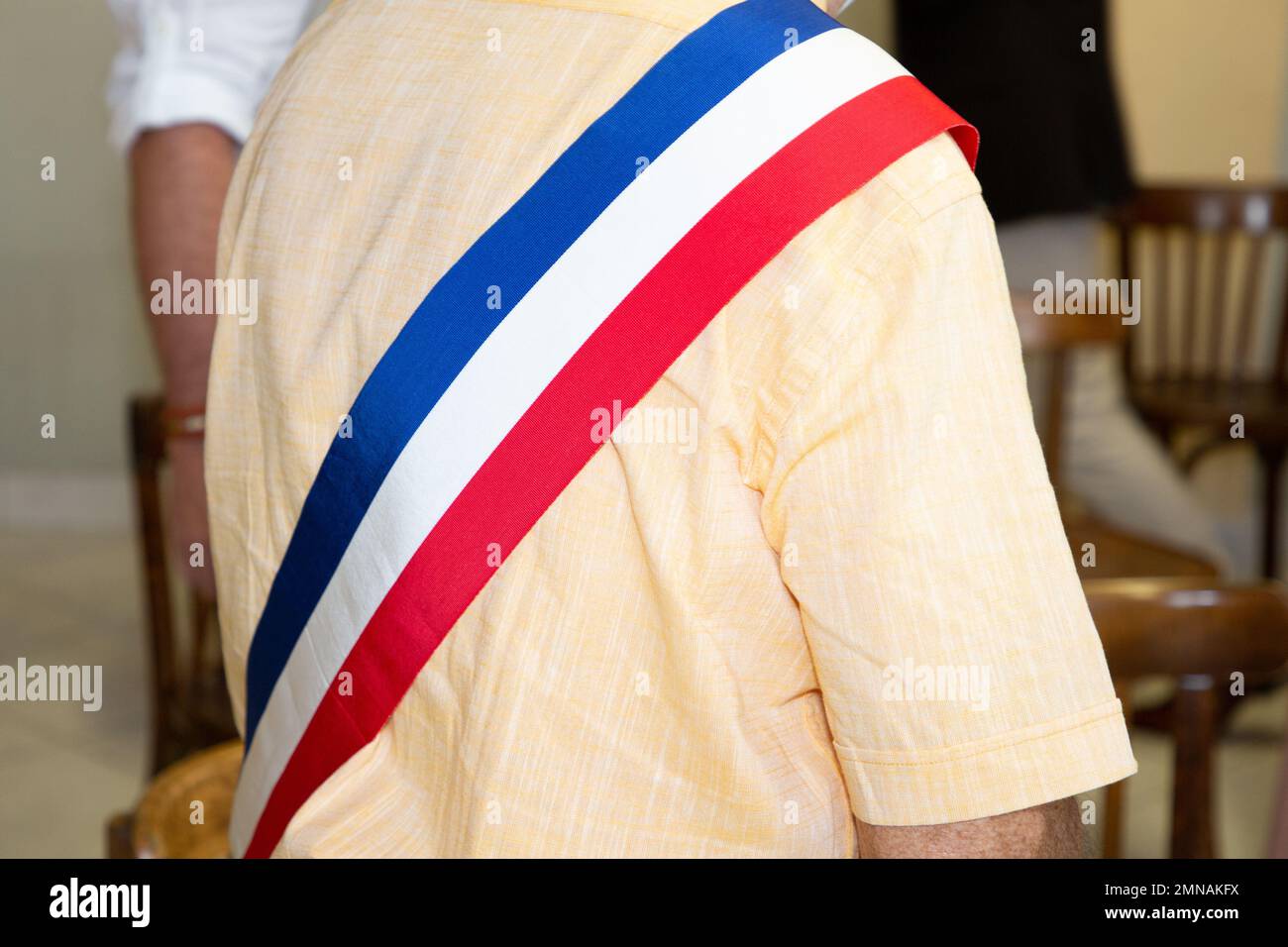 french man with official tricolor scarf flag of mayor during ...
