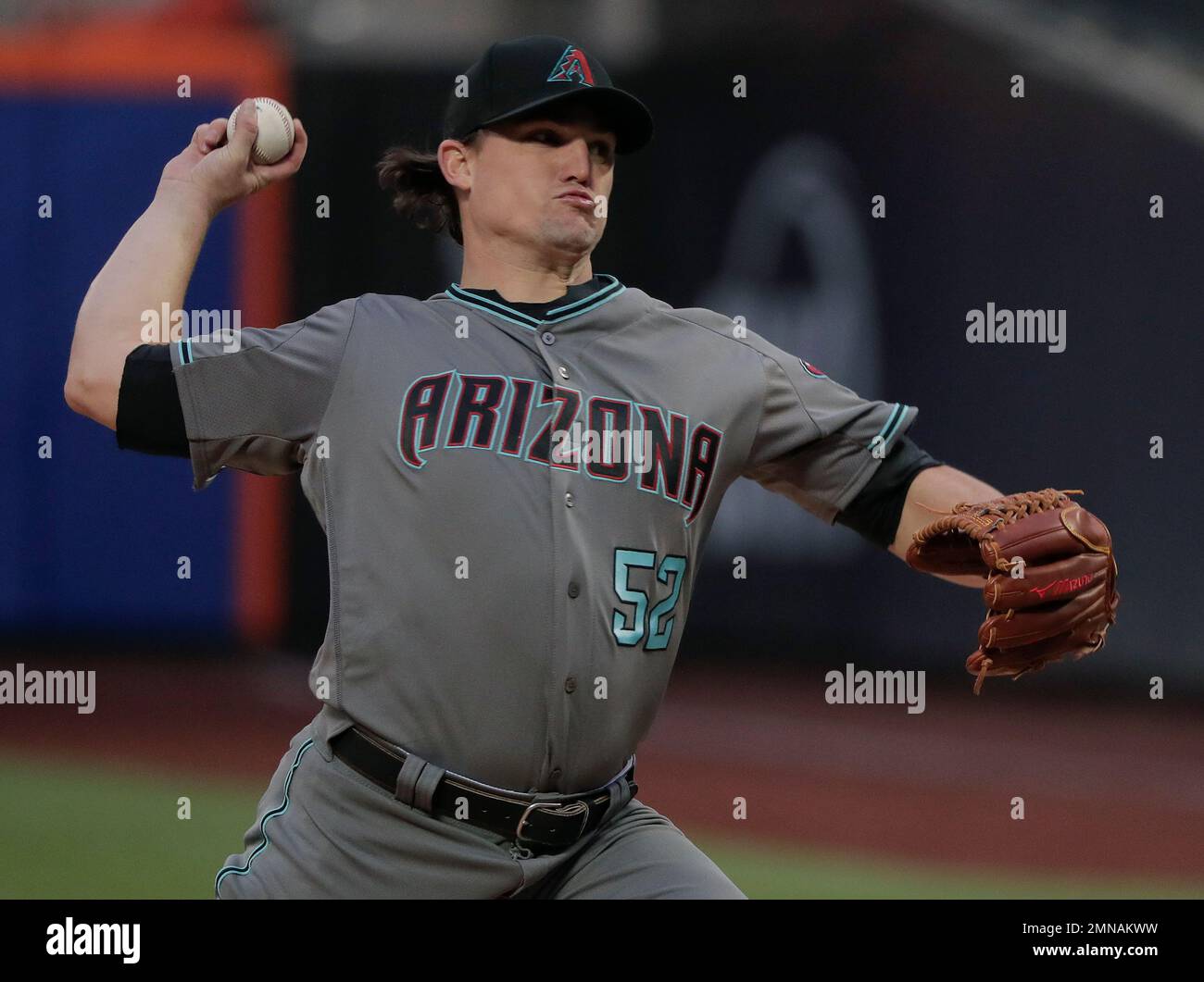 Arizona Diamondbacks pitcher Zack Godley (52) delivers against the New ...
