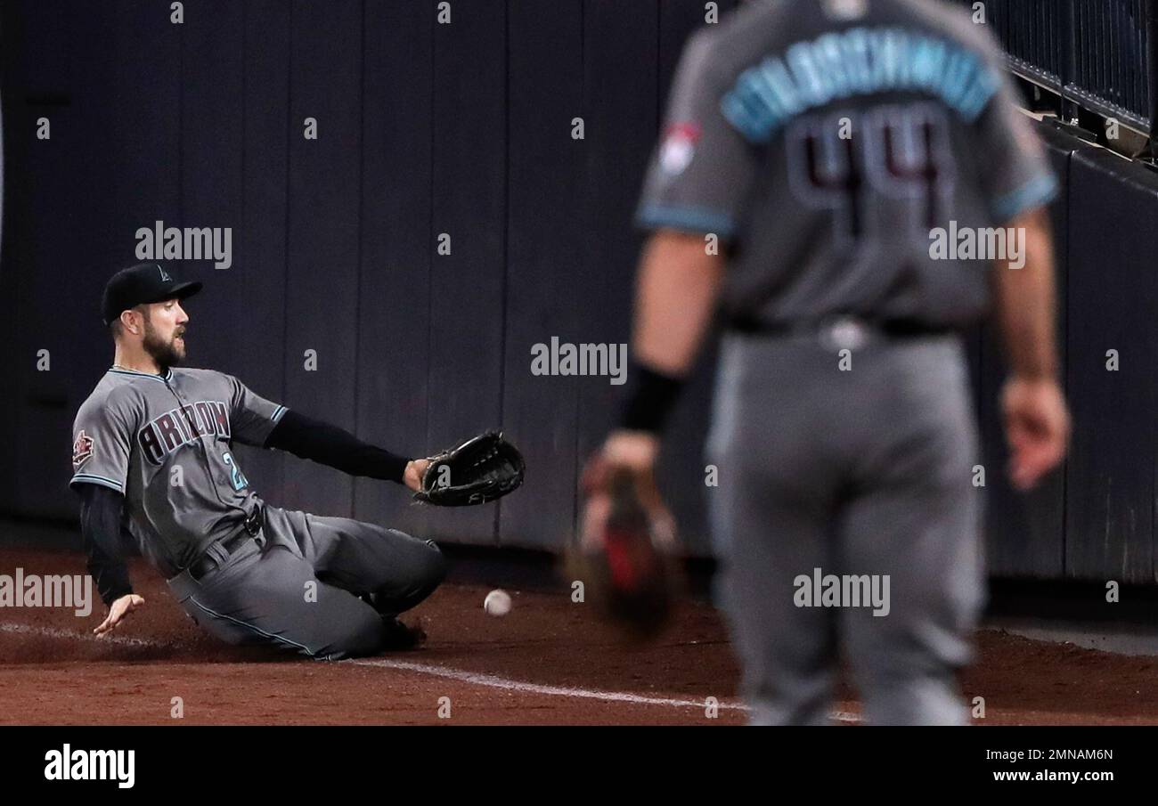 Arizona Diamondbacks right fielder Steven Souza Jr., left, cannot catch ...