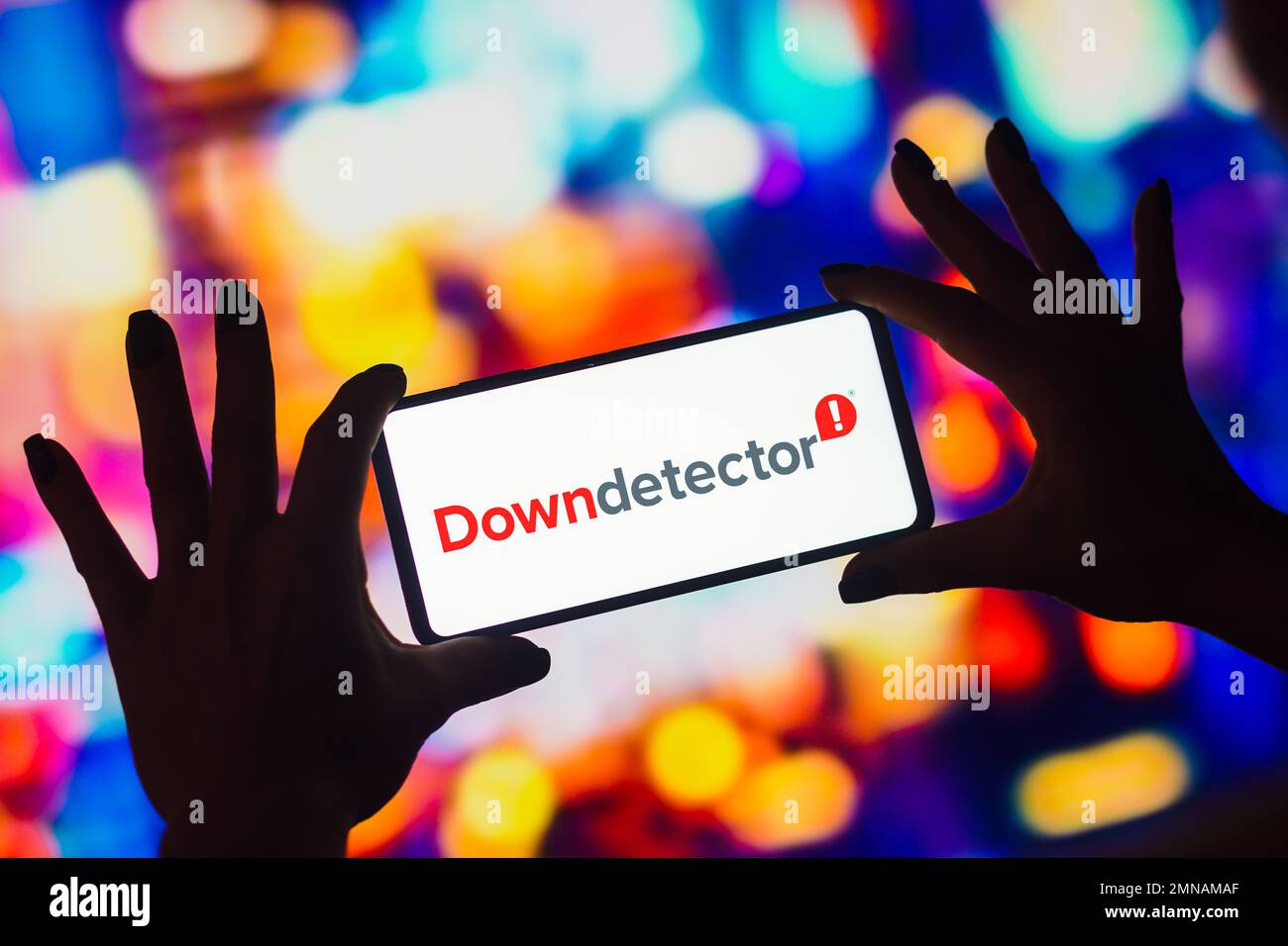 In this photo illustration, the Downdetector logo is displayed on a ...