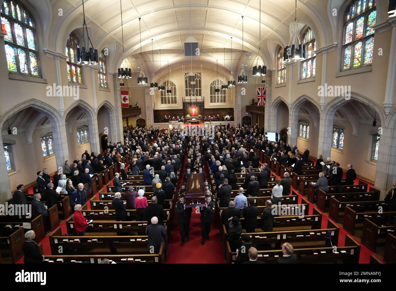 Pallbearers carry the casket of former Ontario lieutenant-governor ...