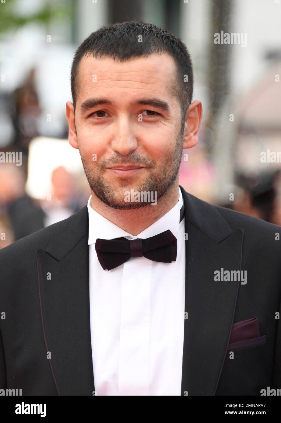 Actor Akin Aksu poses for photographers upon arrival at the premiere of ...