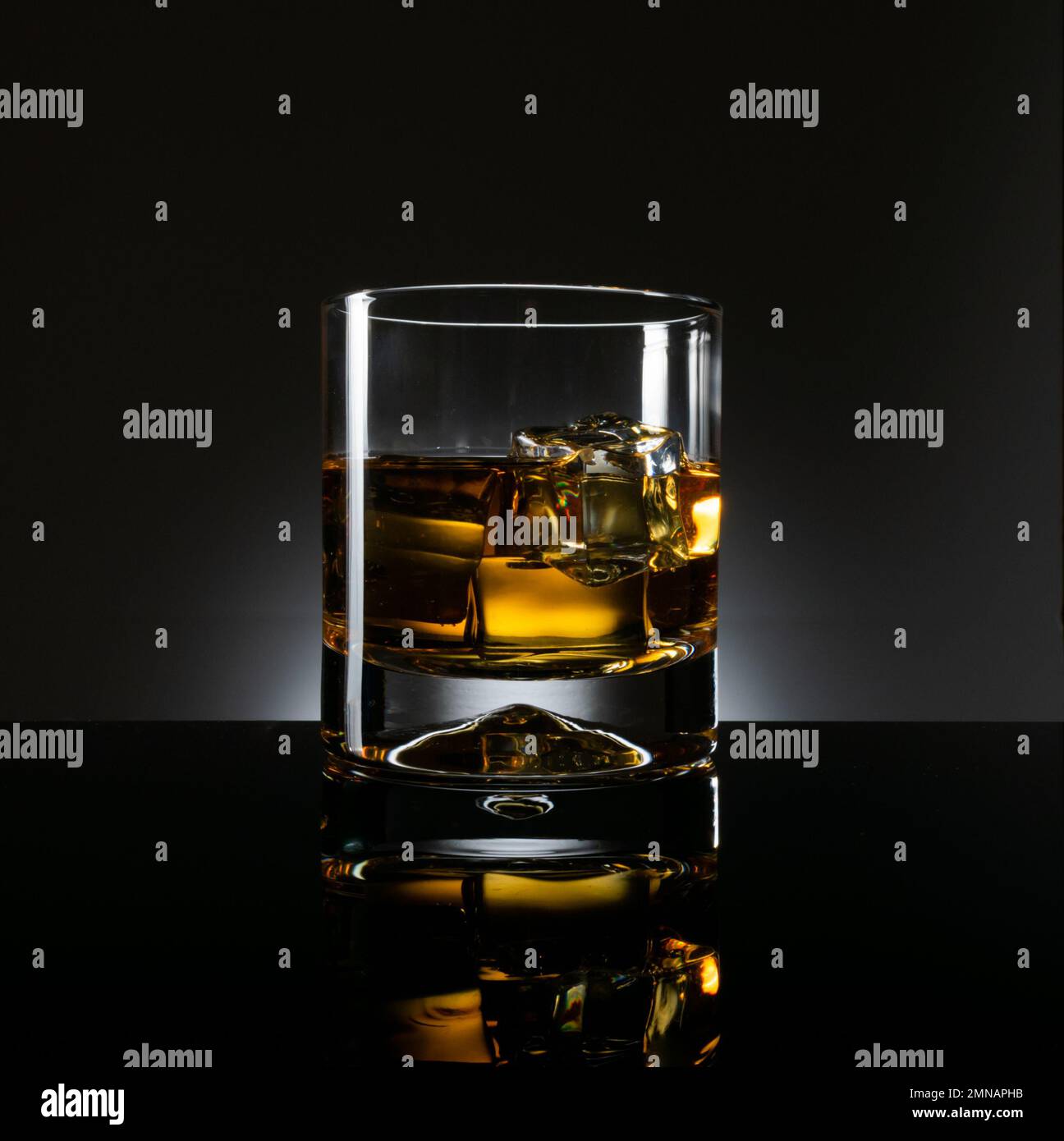 Man in whiskey glasses hi-res stock photography and images - Alamy