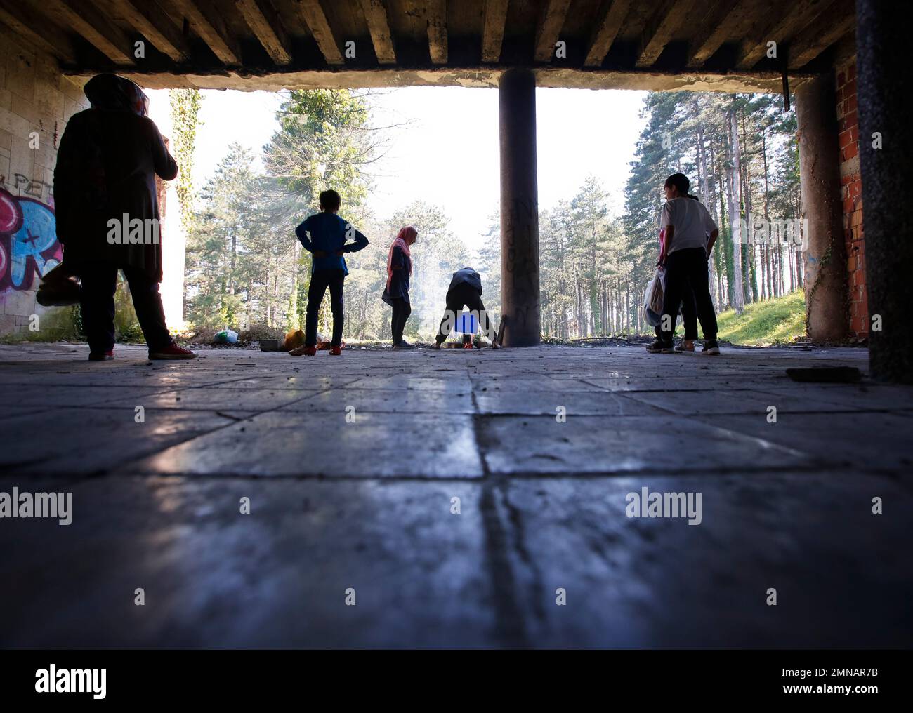 In this Sunday, May 13, 2018, picture, migrants stand inside the ...