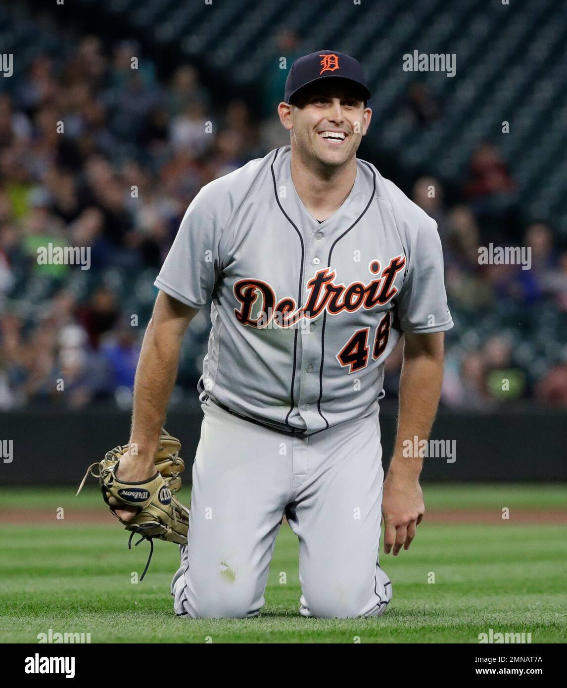 Detroit Tigers starting pitcher Matthew Boyd smiles after crouching to ...