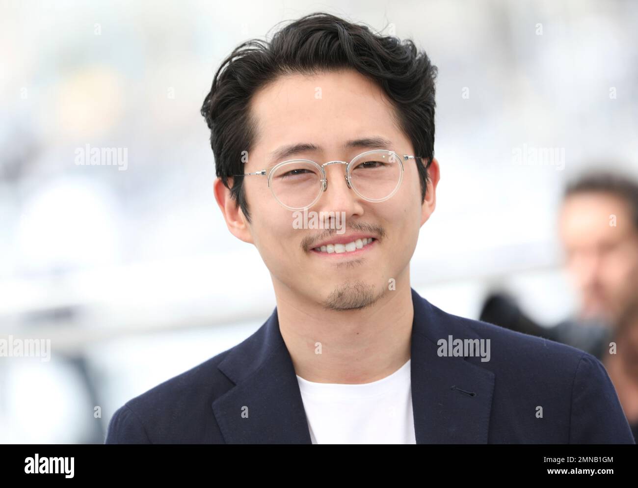 Actor Steven Yeun poses for photographers during a photo call for the ...