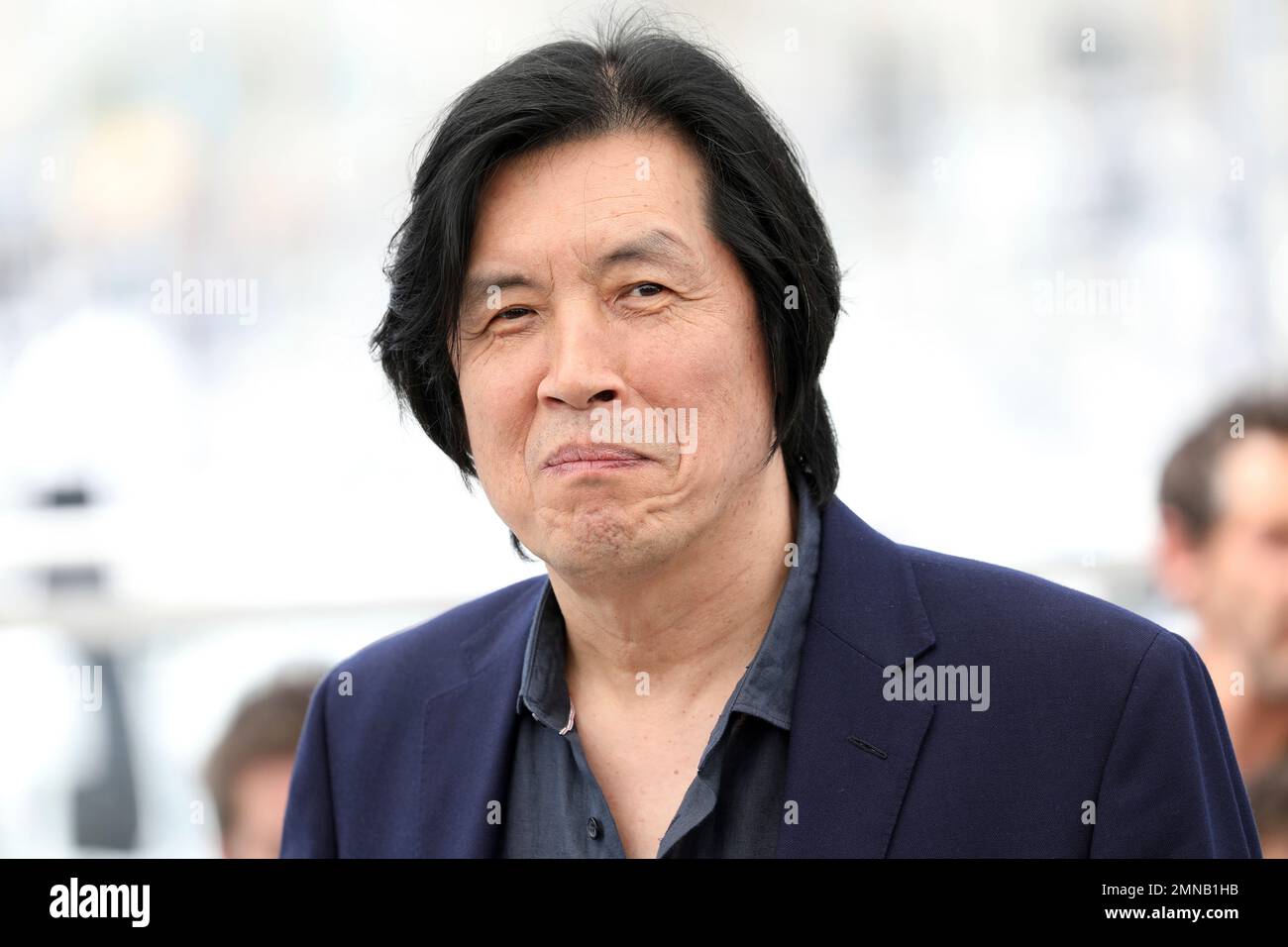 Director Chang-dong Lee poses for photographers during a photo call for ...
