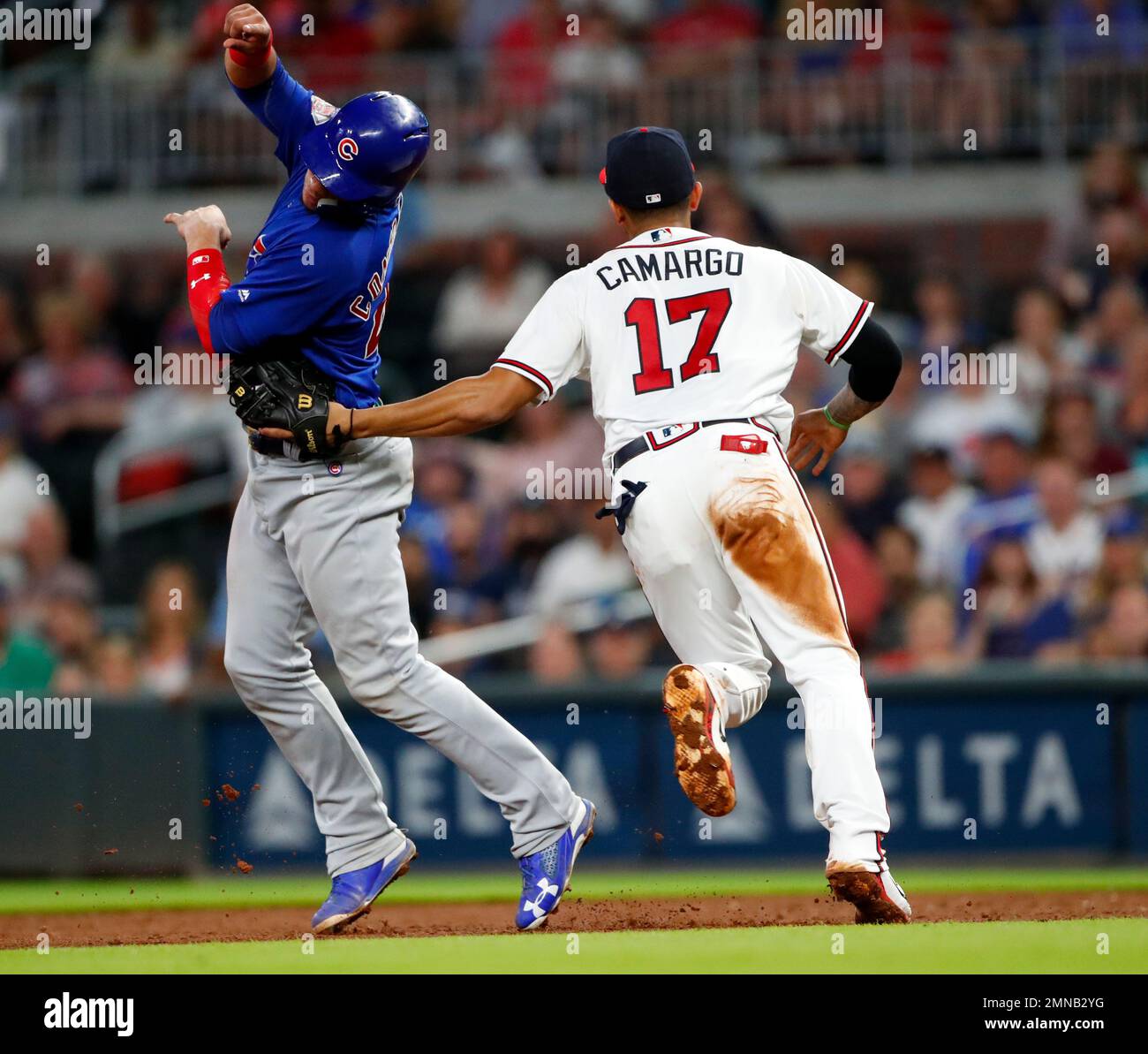 Chicago Cubs' Willson Contreras (40) is tagged out by Atlanta Braves ...