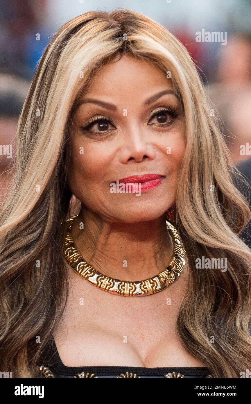 Singer La Toya Jackson poses for photographers upon arrival at the ...