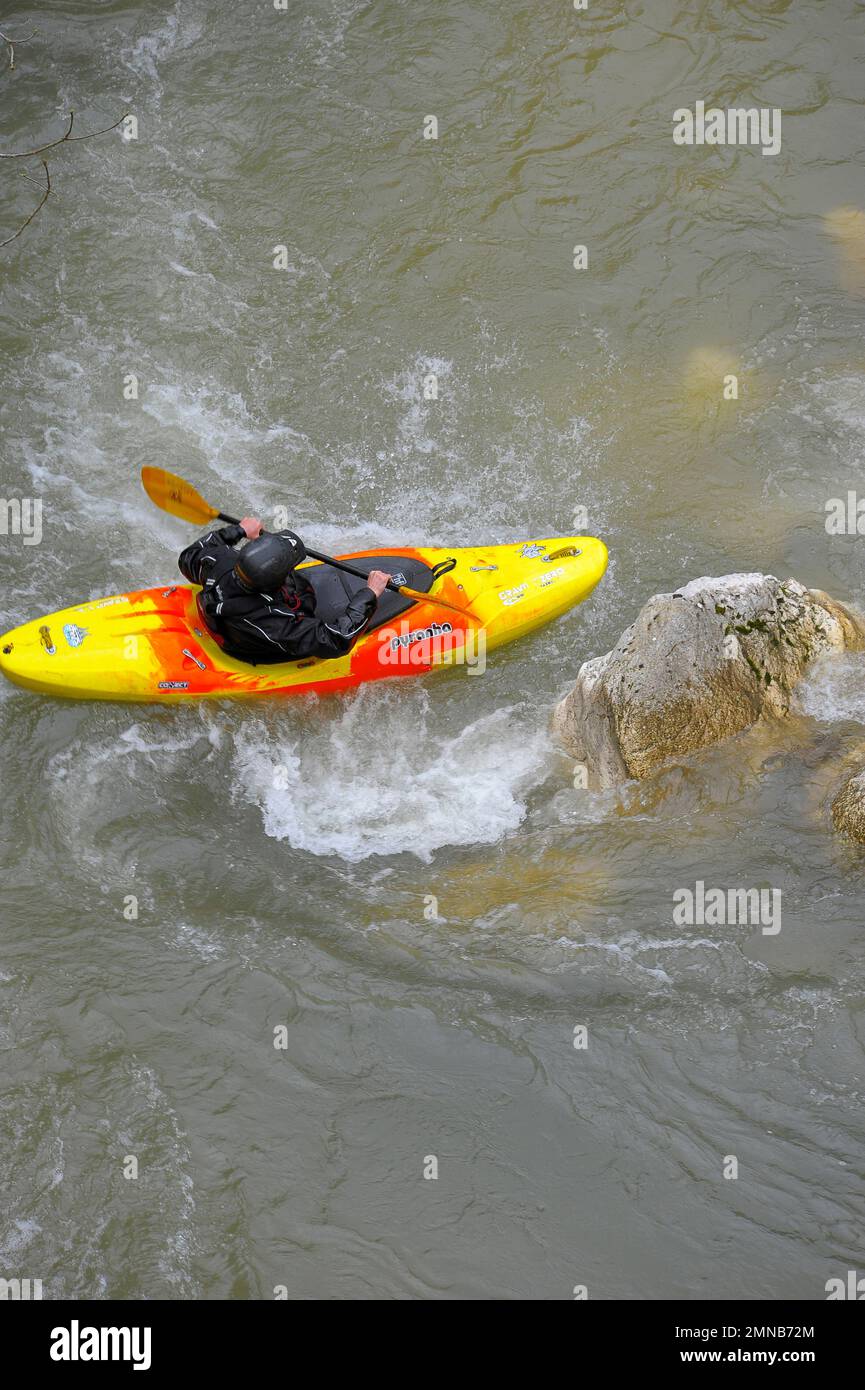 A whitewater kayaker running a rapid on the river Stock Photo - Alamy