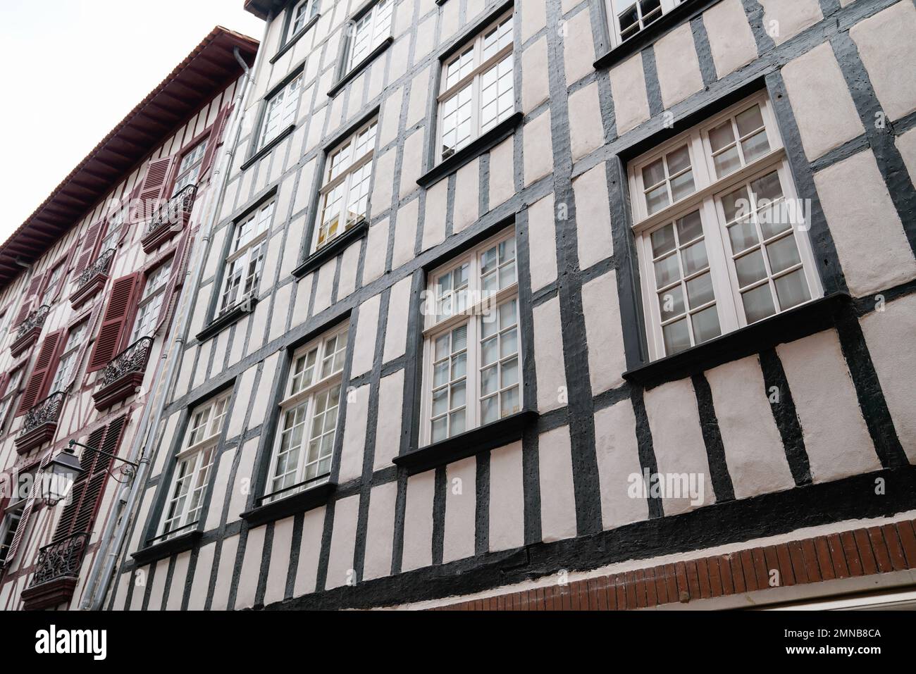 Traditional ancient white house in Bayonne bask city in french Basque ...