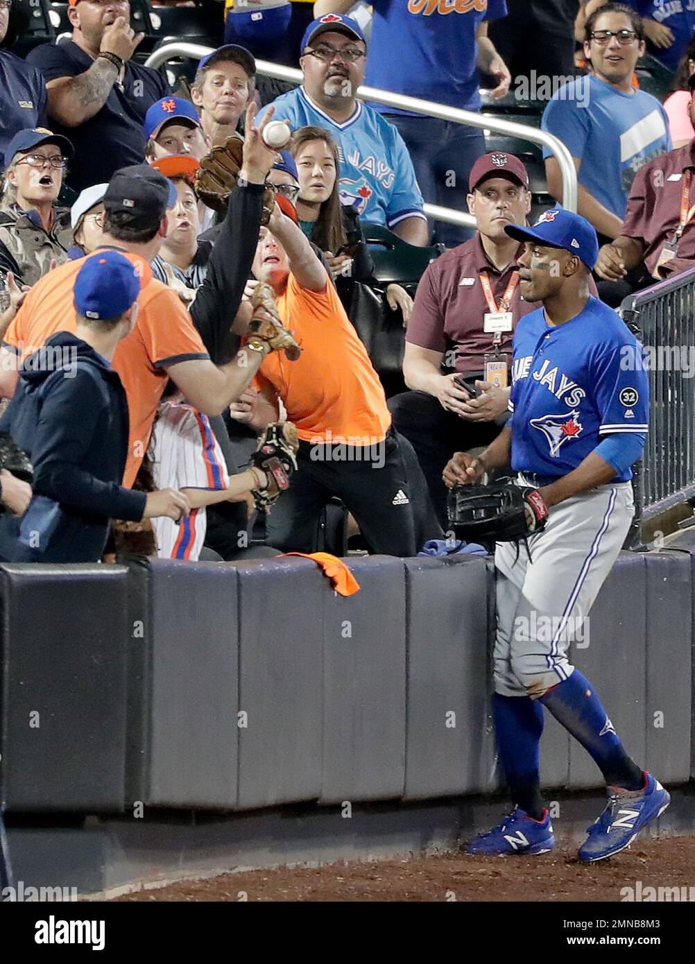 Fans reach for a ground rule double by New York Mets' Jay Bruce as ...