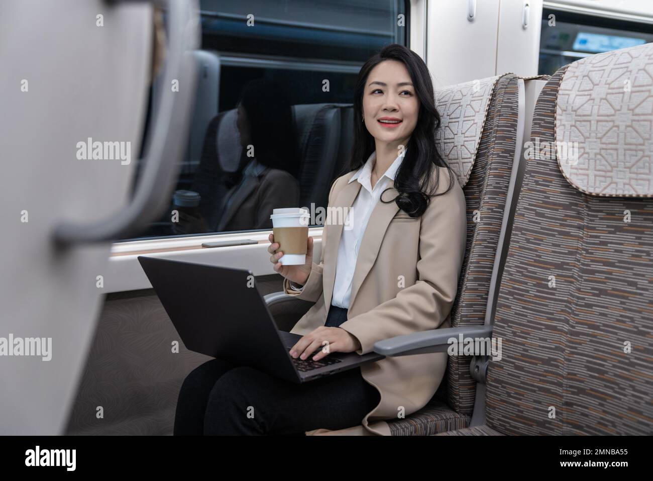 Take the subway office business woman Stock Photo - Alamy
