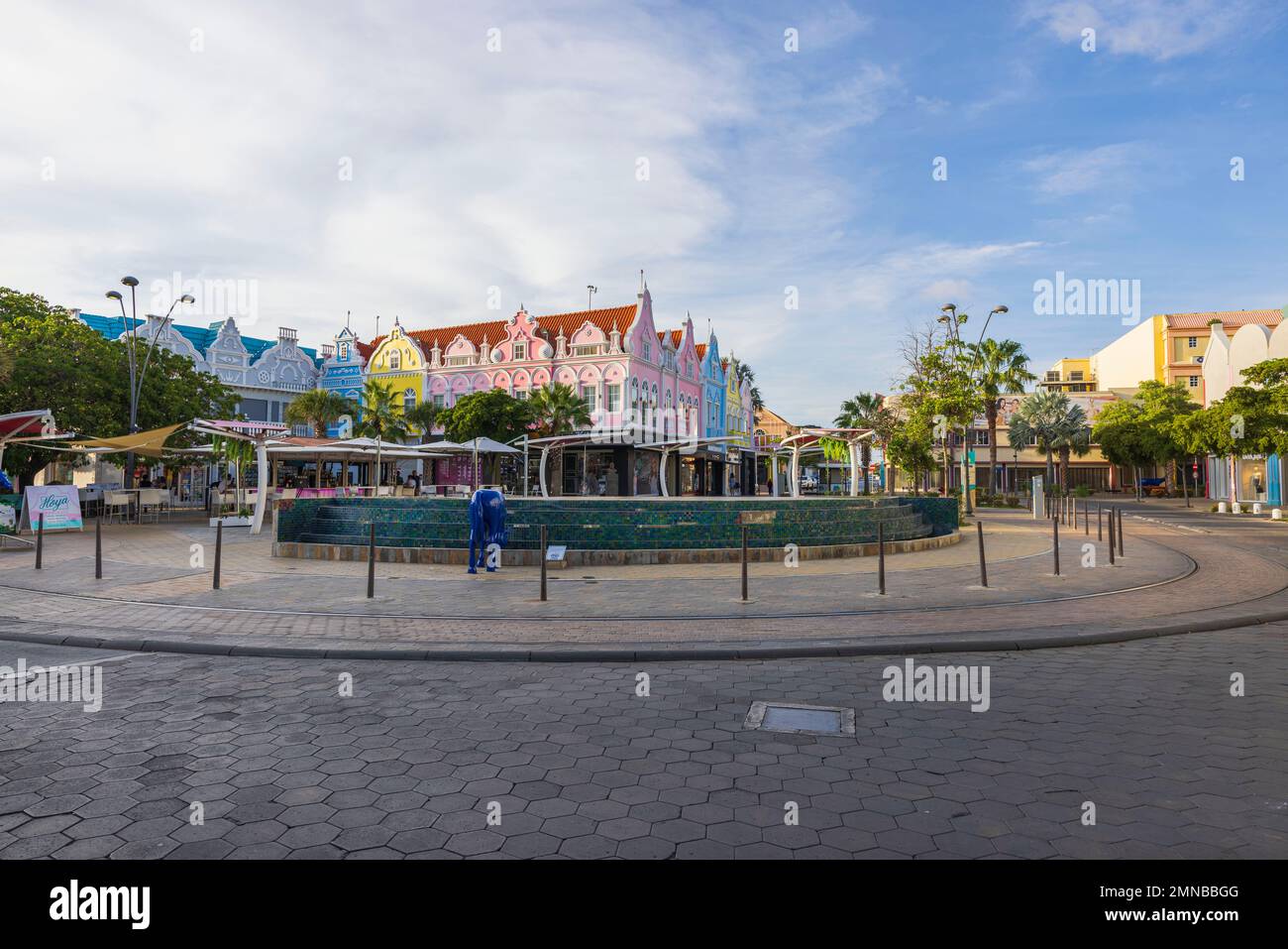 Beautiful colorful cityscape view of downtown Oranjestad on blue sky ...
