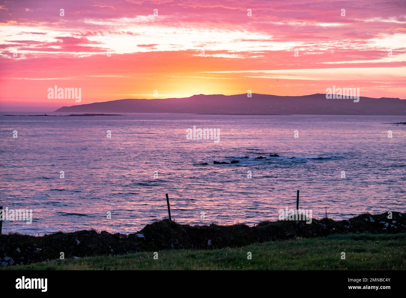 Sunset above Aran Island - Arranmore - County Donegal, Ireland Stock ...