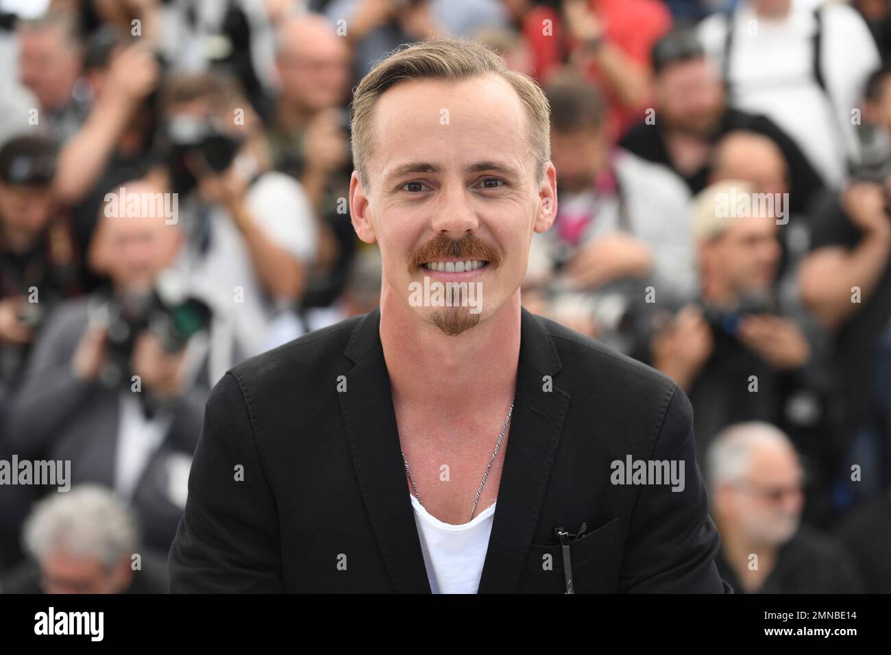 Actor Jasper Paakkonen poses for photographers during a photo call for ...