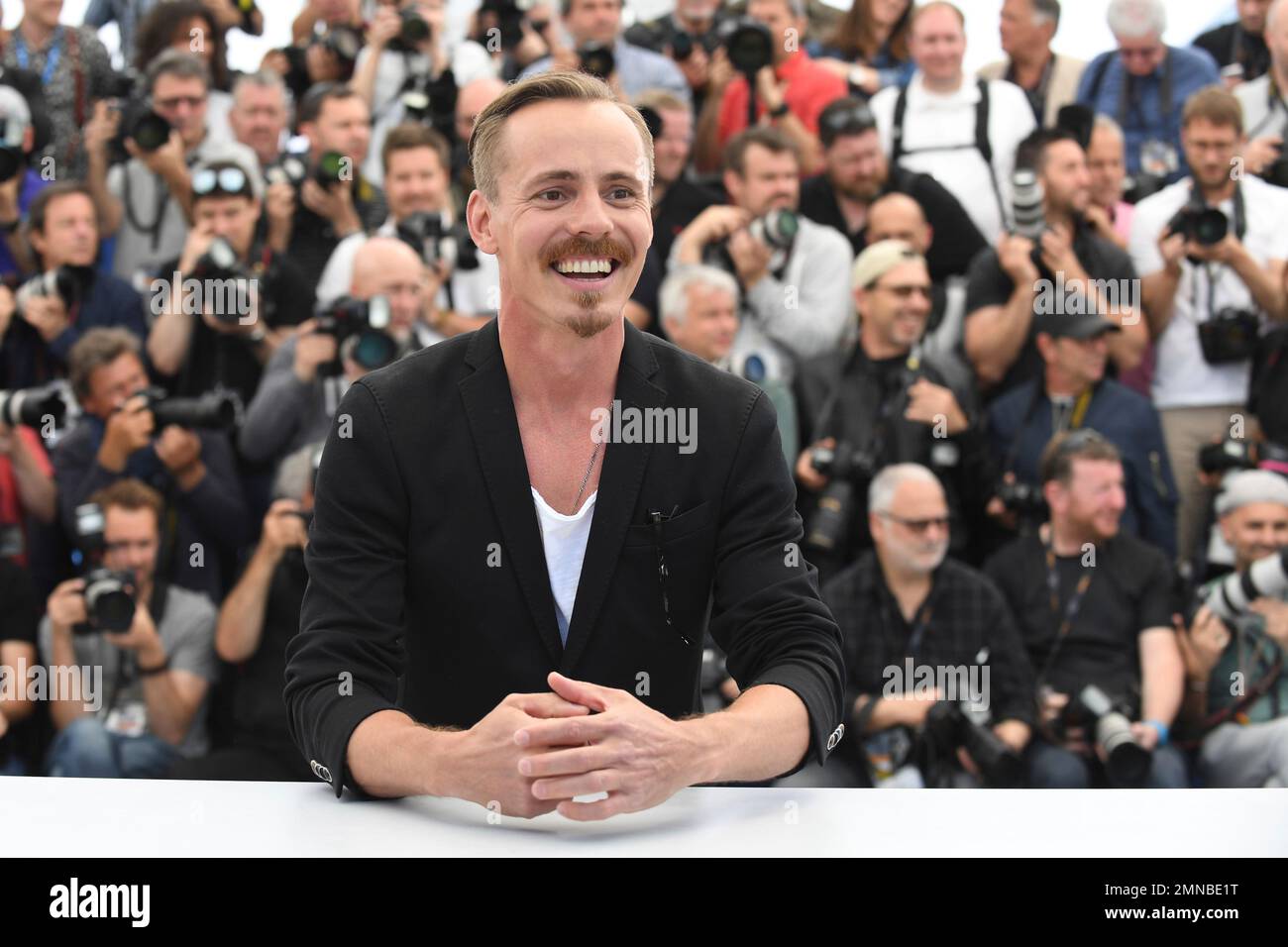 Actor Jasper Paakkonen poses for photographers during a photo call for ...