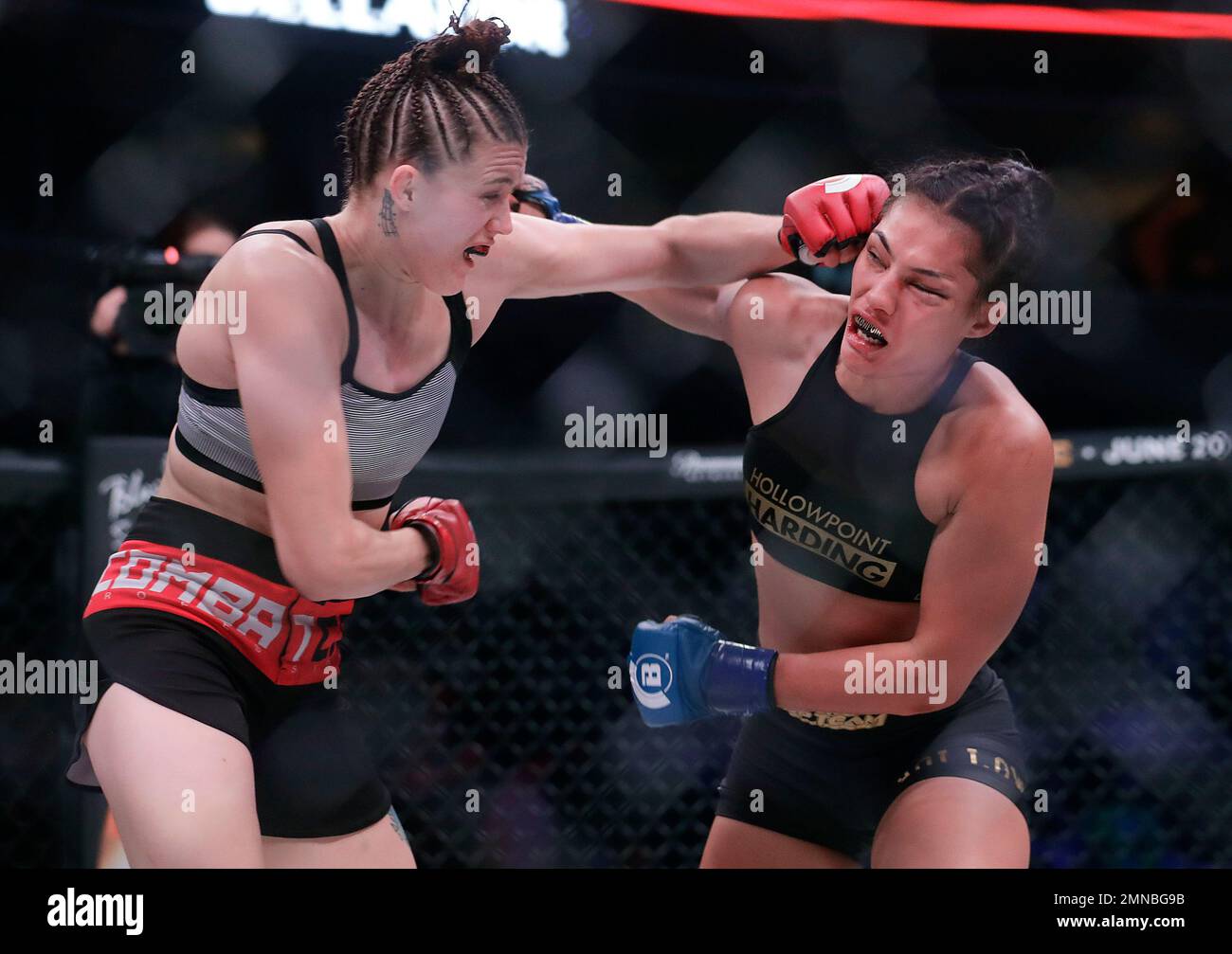 Amber Leibrock, left, punches Janay Harding during a featherweight ...