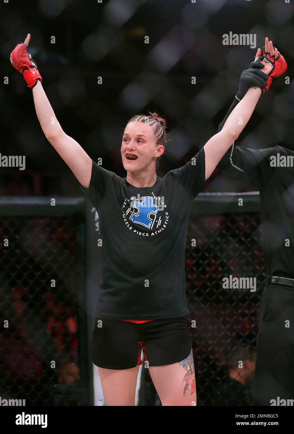 Amber Leibrock celebrates after defeating Janay Harding in a ...