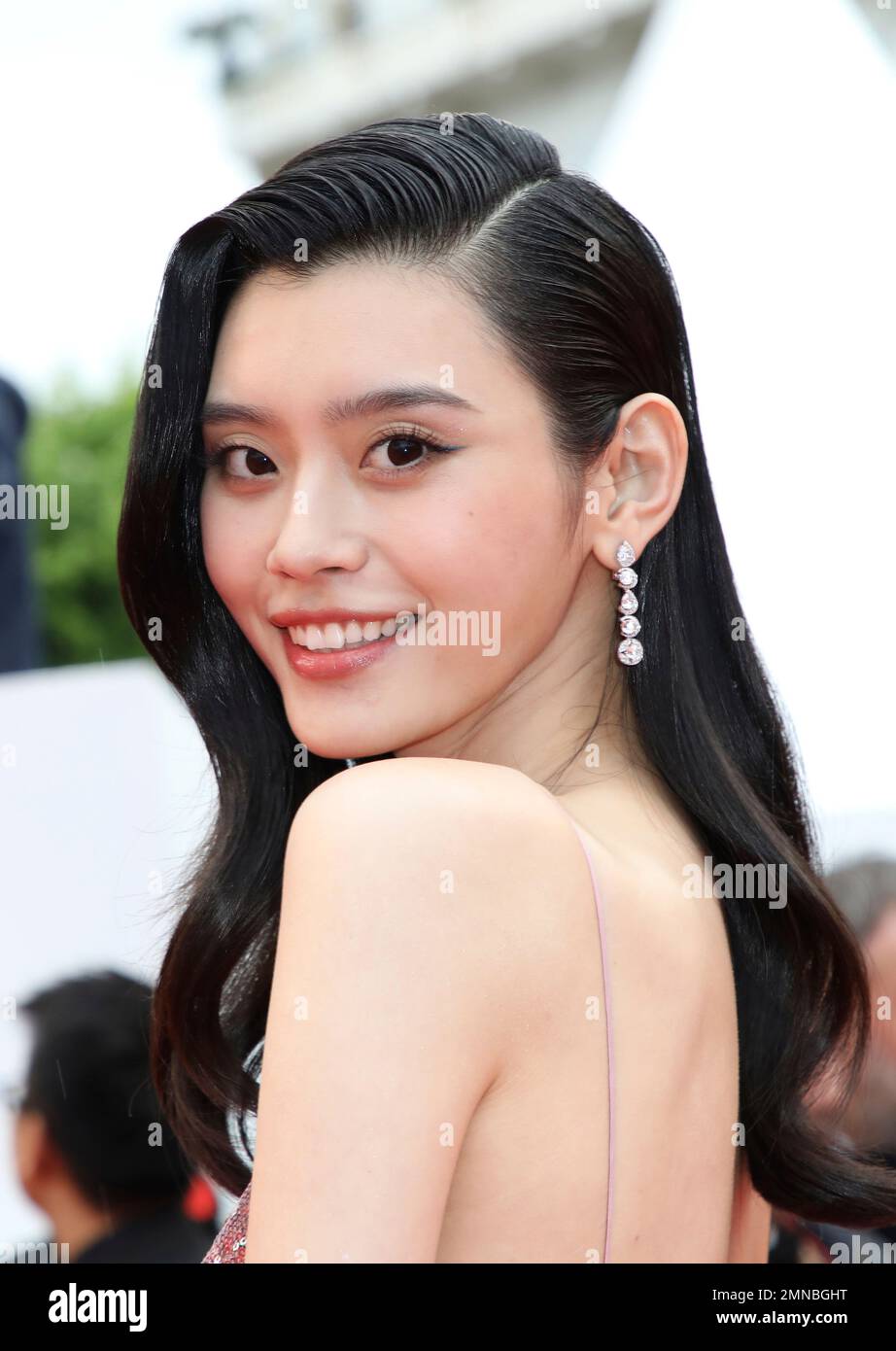 Model Ming Xi poses for photographers upon arrival at the premiere of ...