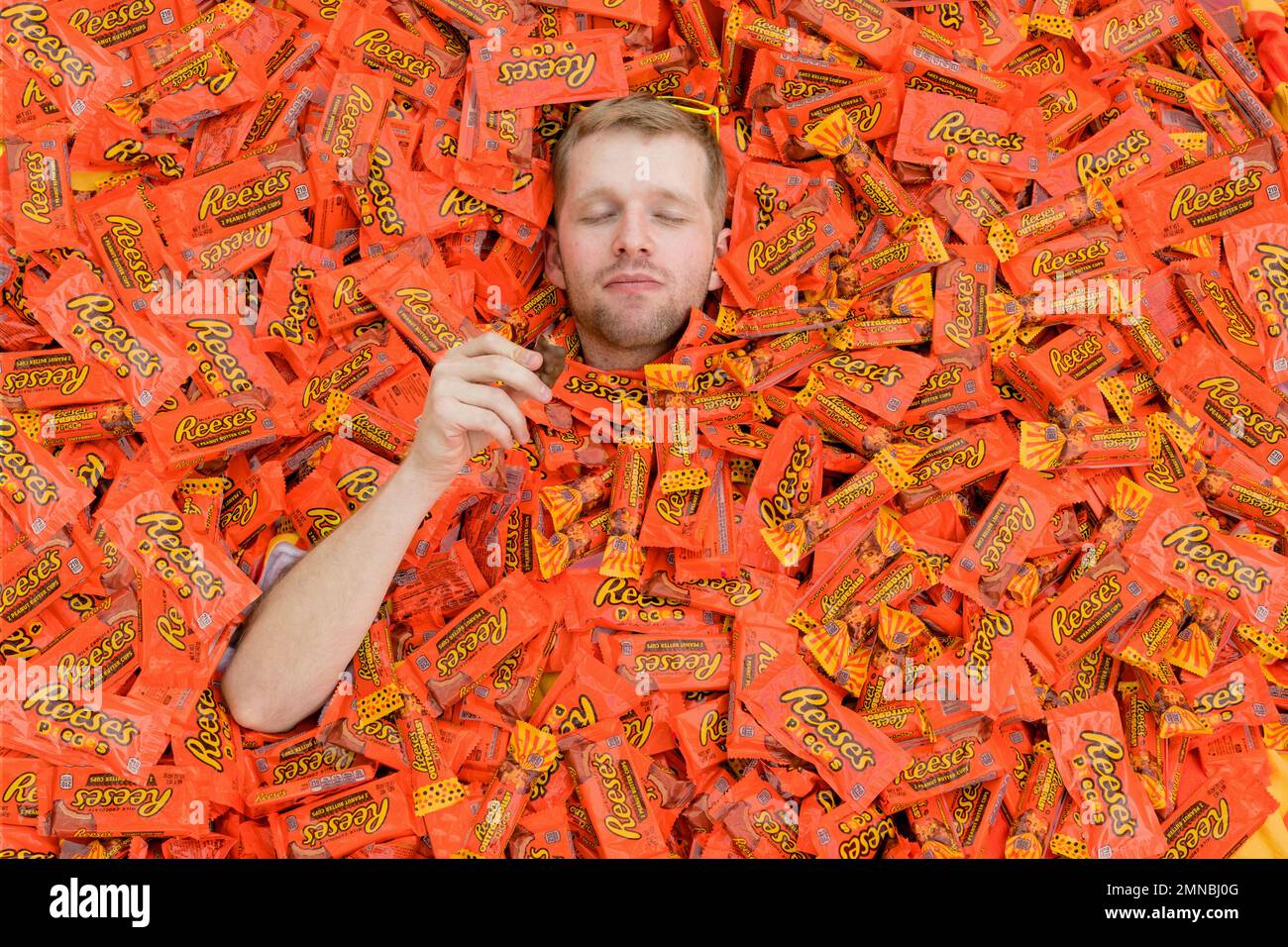 IMAGE DISTRIBUTED FOR REESE'S - Reese’s super fan, Jon Ernst, enjoys a ...