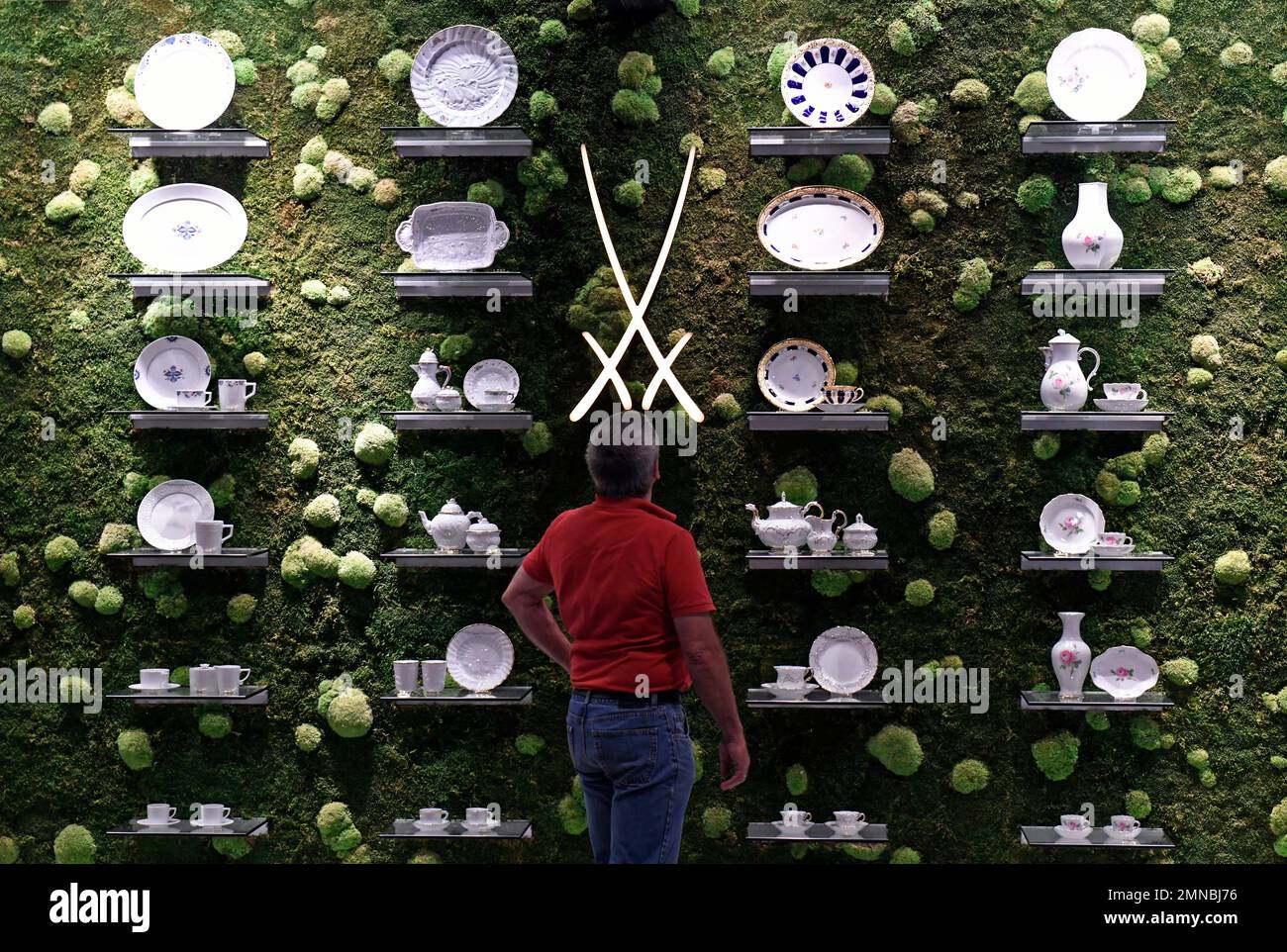 A visitor stands under the crossed swords in the permanent exhibition ...