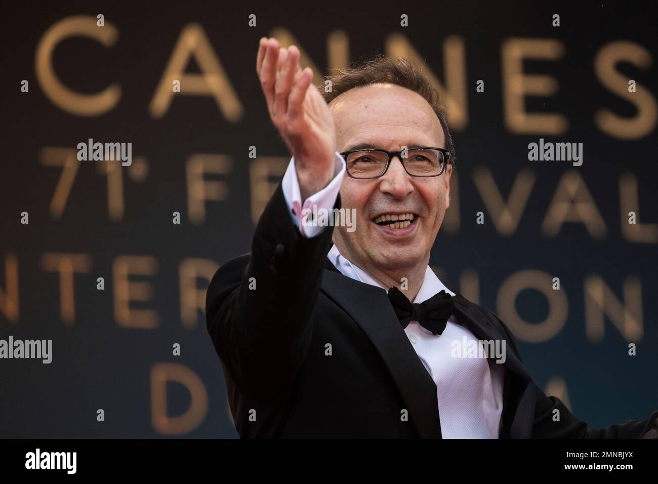 Actor Roberto Benigni poses for photographers upon arrival at the ...