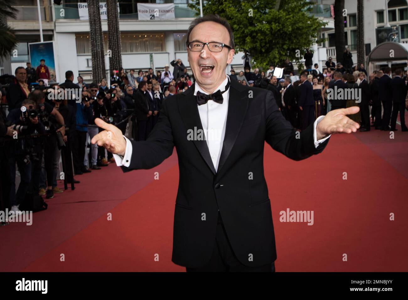 Actor Roberto Benigni poses for photographers upon arrival at the ...