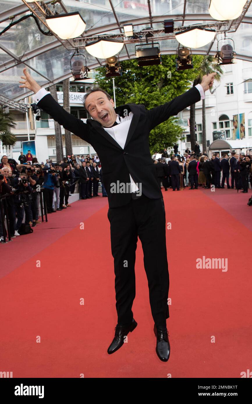 Actor Roberto Benigni poses for photographers upon arrival at the ...