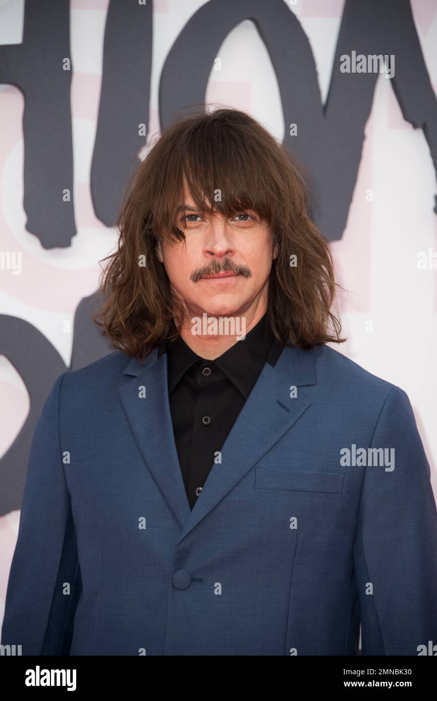 Casey Spooner poses for photographers upon arrival at the Fashion For ...