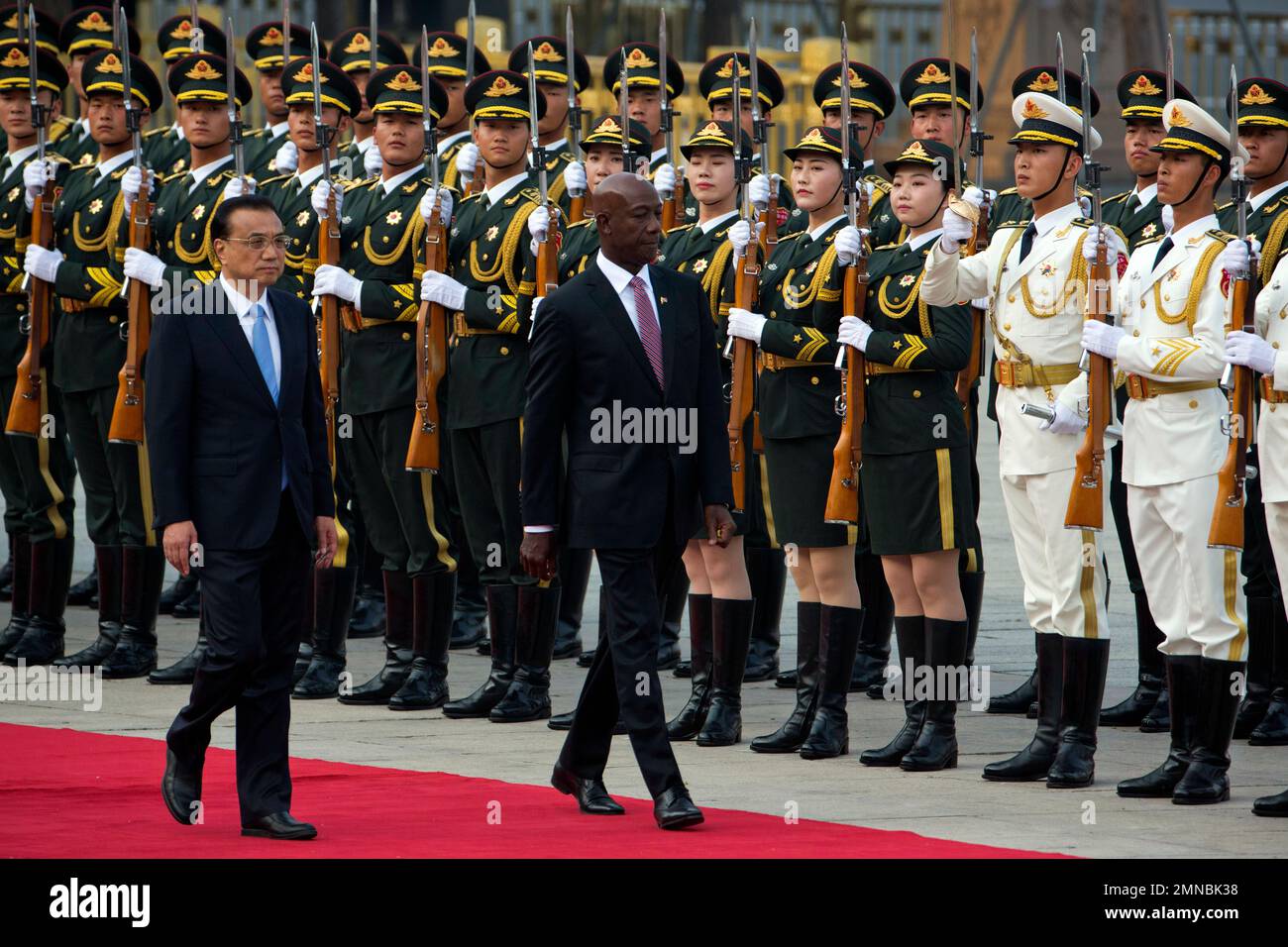 Trinidad and Tobago Prime Minister Keith Rowley walks with Chinese ...