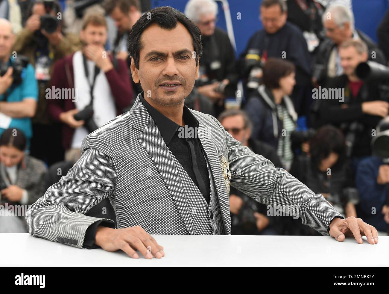 Actor Nawazuddin Siddiqui poses for photographers during a photo call ...