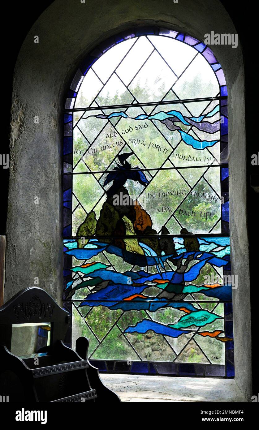A stained glass window in the Church of All Saints on the island of ...