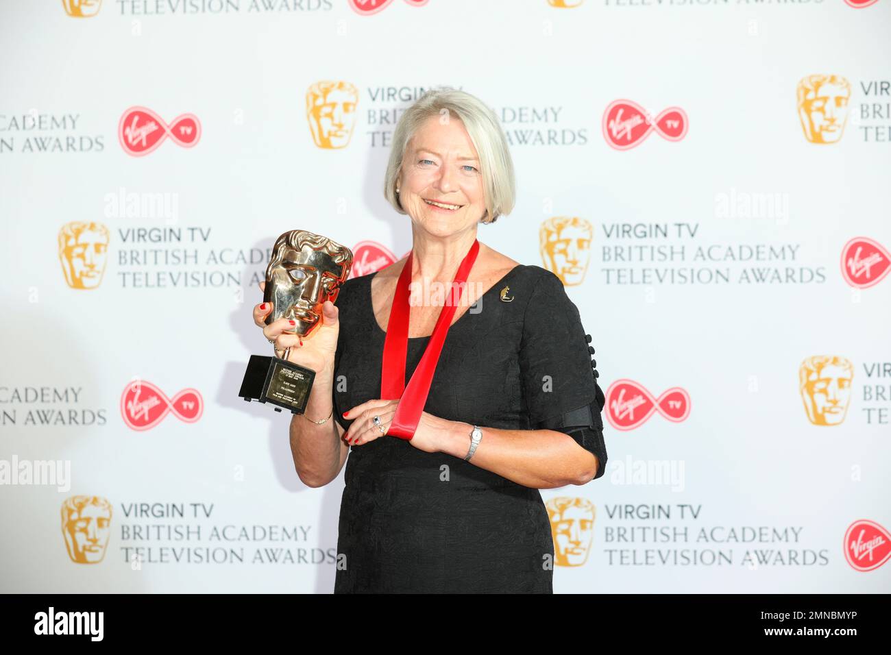 Tv Presenter Kate Adie poses for photographers with her Fellowship ...