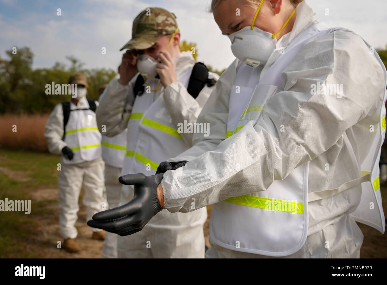 Airmen with the 114th Fighter Wing Force Support Squadron don personal ...