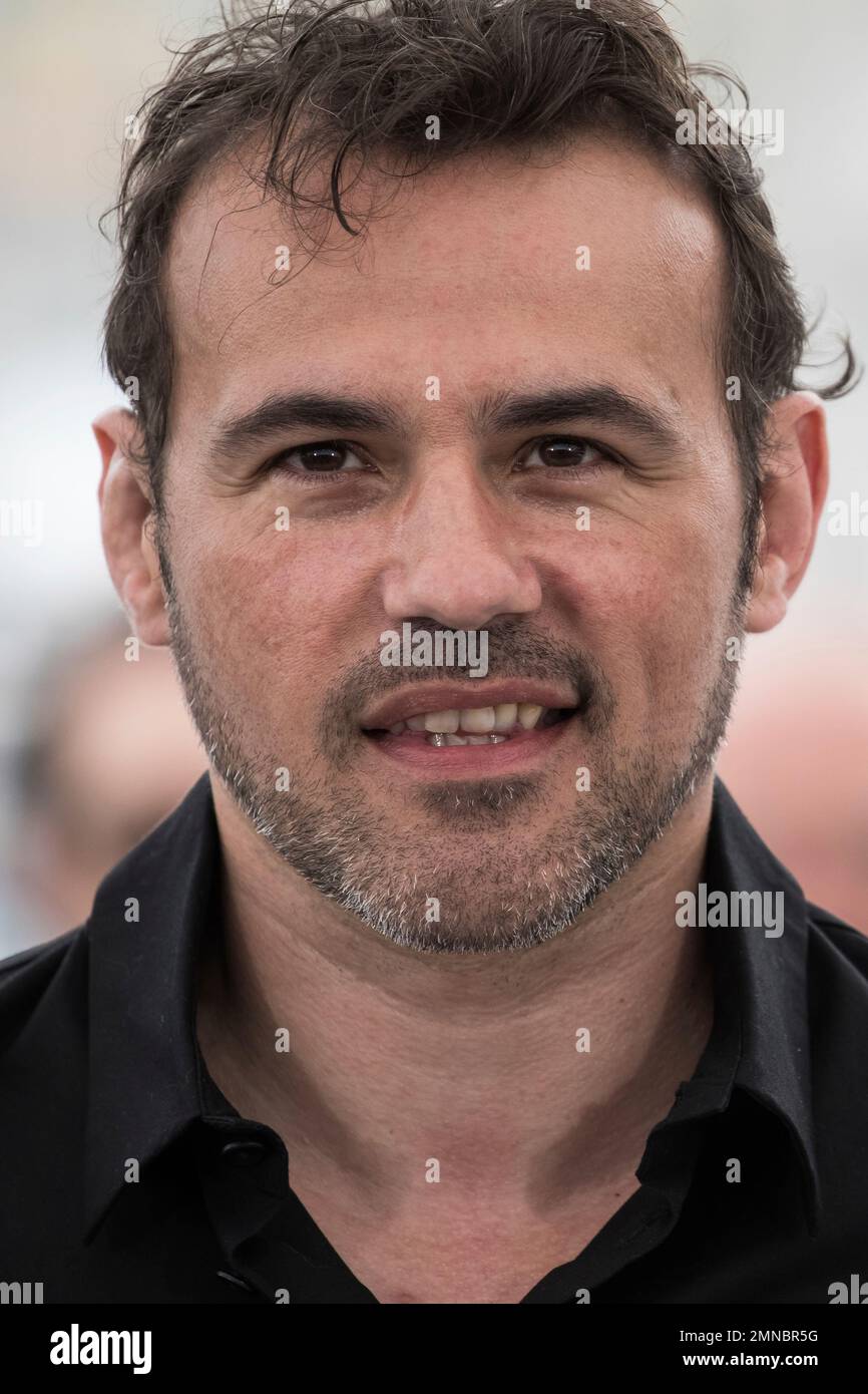 Actor Stephane Rideau poses for photographers during a photo call for ...