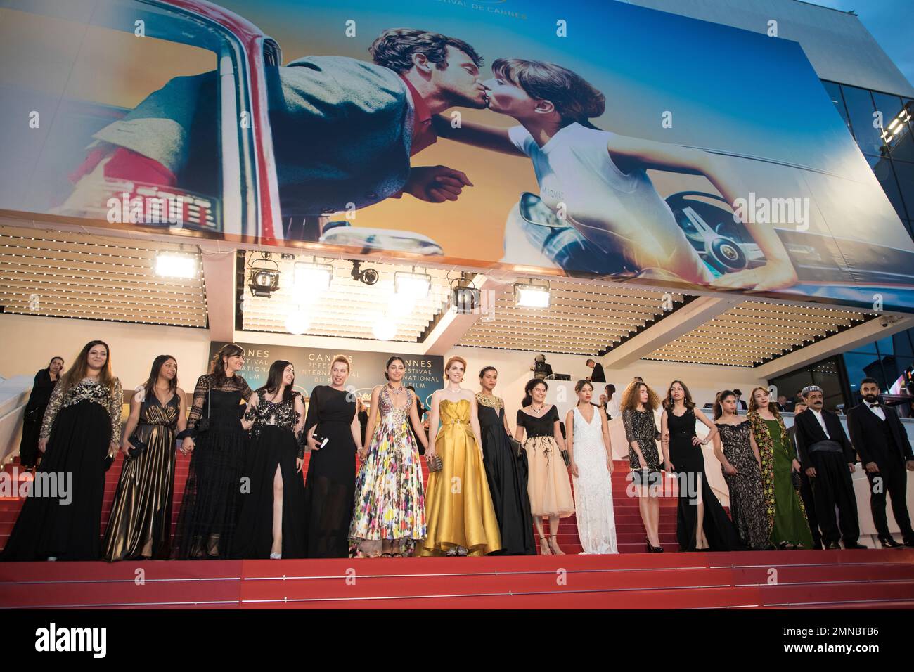 Cast and crew of the film 'Girls of The Sun' pose for photographers ...