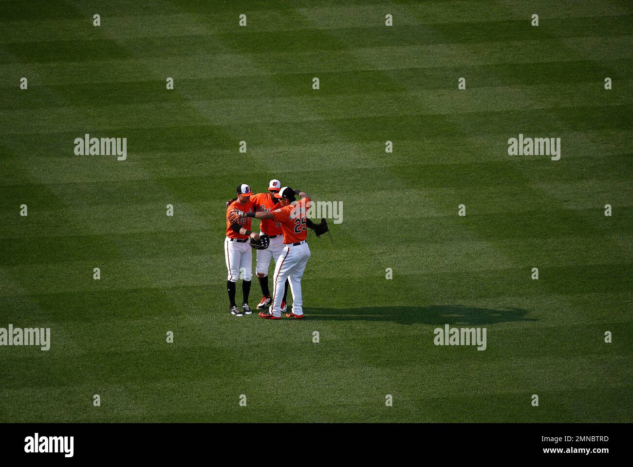 Baltimore Orioles outfielders Craig Gentry, from left, Adam Jones and ...
