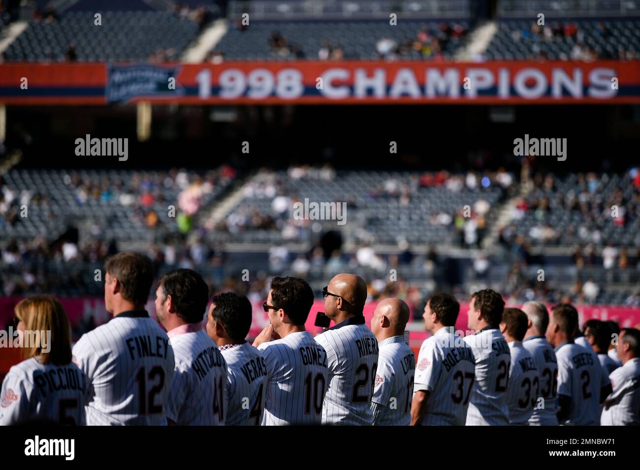 The San Diego Padres 1998 team stand before a ceremony to induct former ...