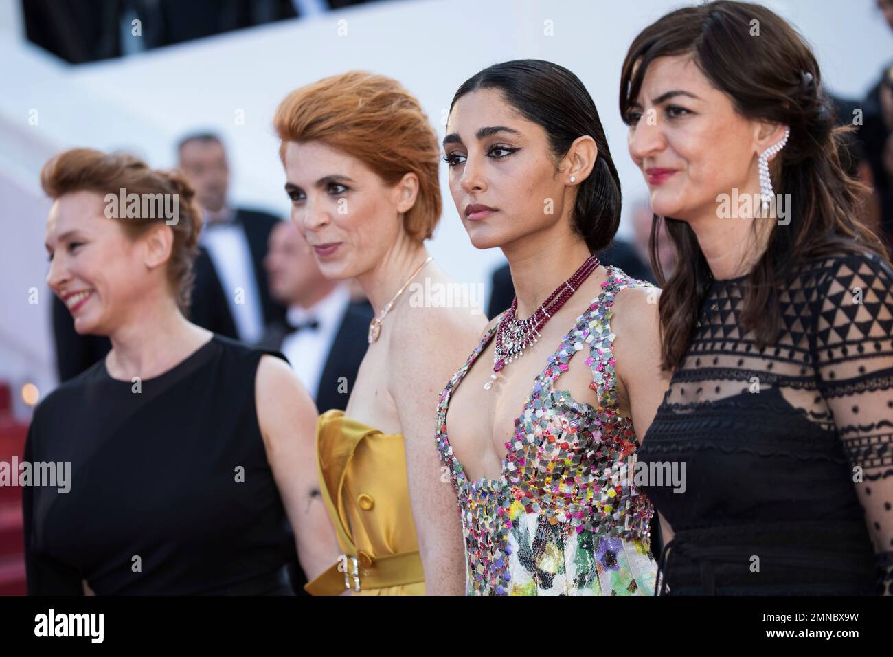 Cast and crew of the film 'Girls of The Sun' pose for photographers ...