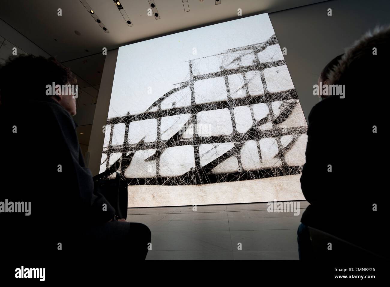 Visitors browse Refik Anadol's "Unsupervised" exhibit at the Museum of ...
