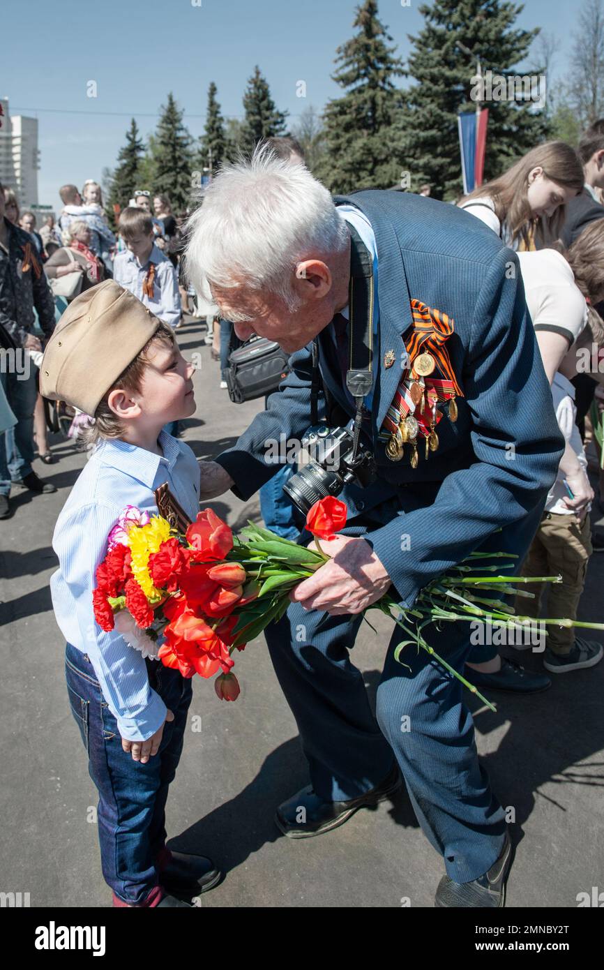 KOLOMNA Moscow Region Russia May 9 2015 A Little Boy Congratulates KOLOMNA Moscow Region Russia May 9 2015 A Little Boy Congratulates