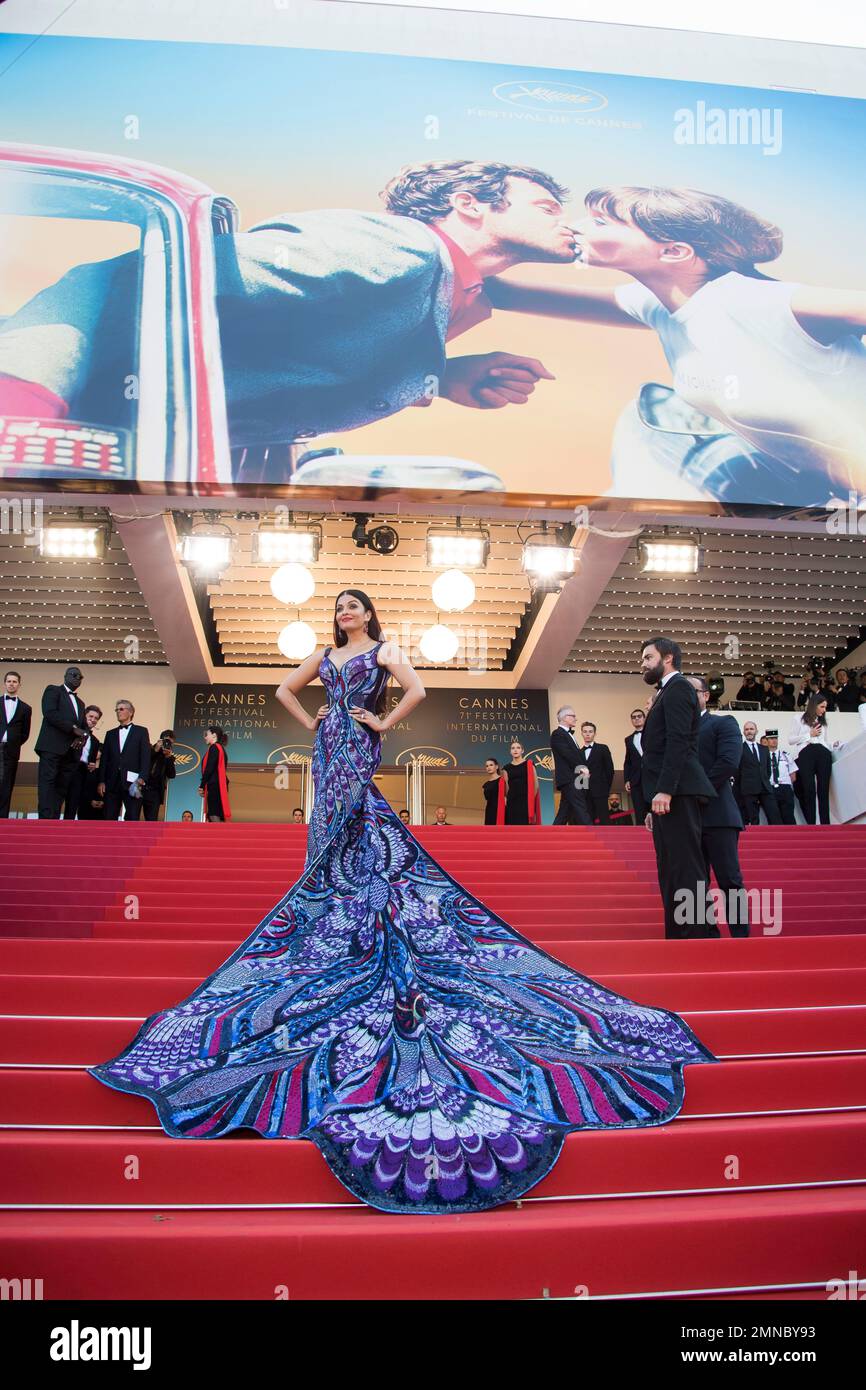 Actress Aishwarya Rai Bachchan poses for photographers upon arrival at ...