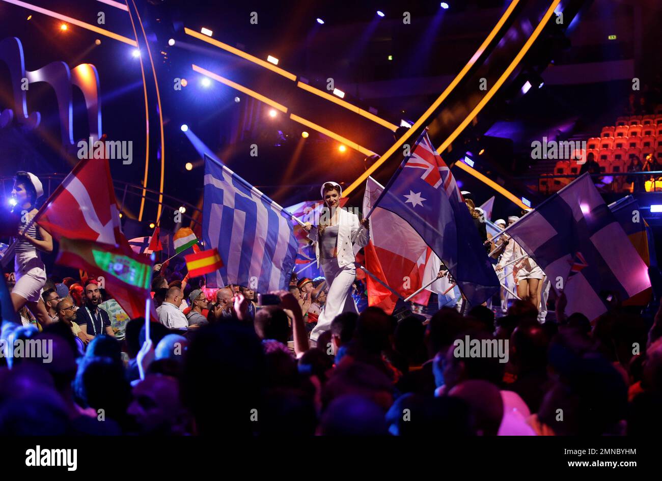 The flags of the competing countries are carried into the arena in ...